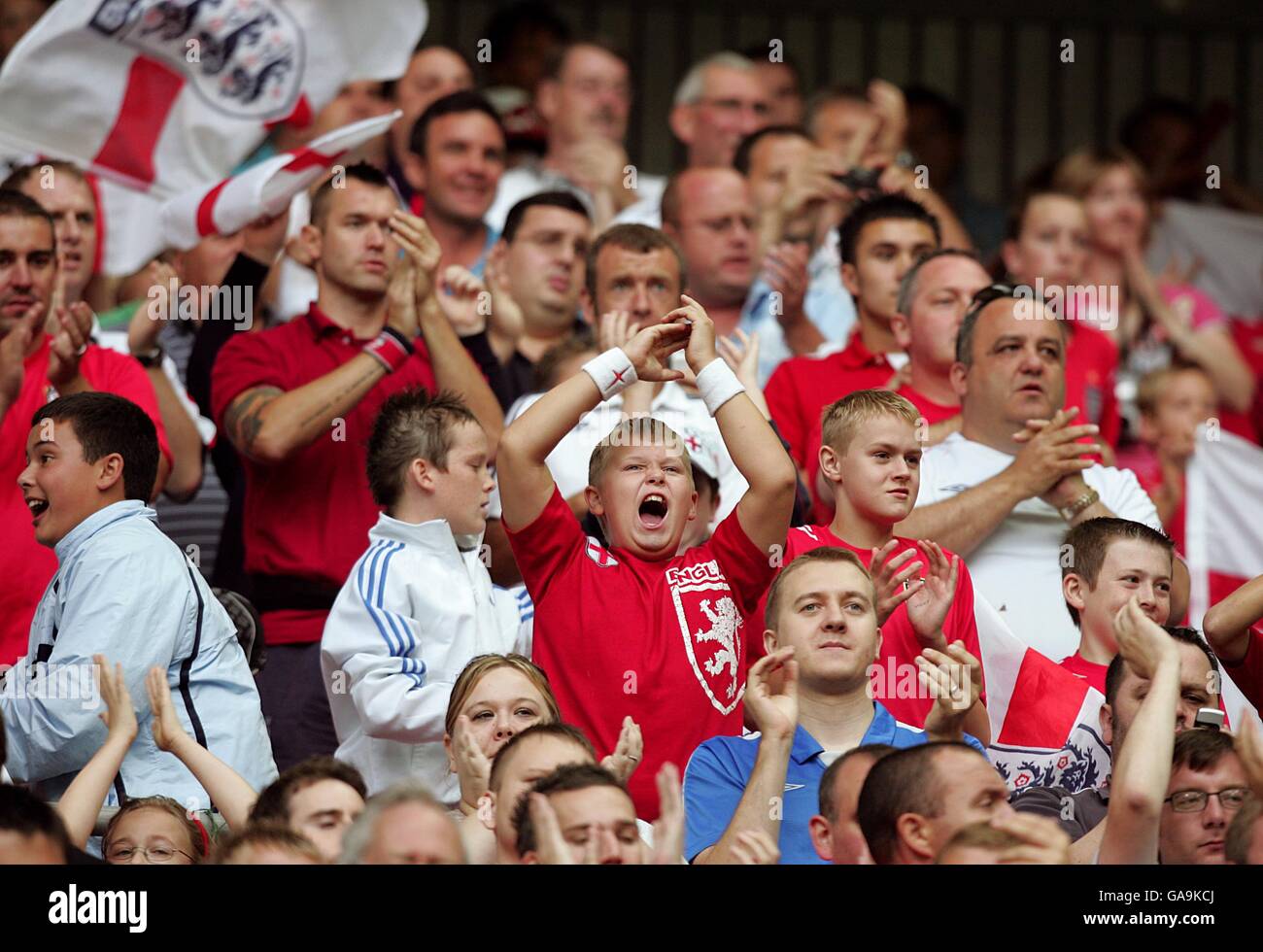 Football fans shout in the stands hi-res stock photography and images ...