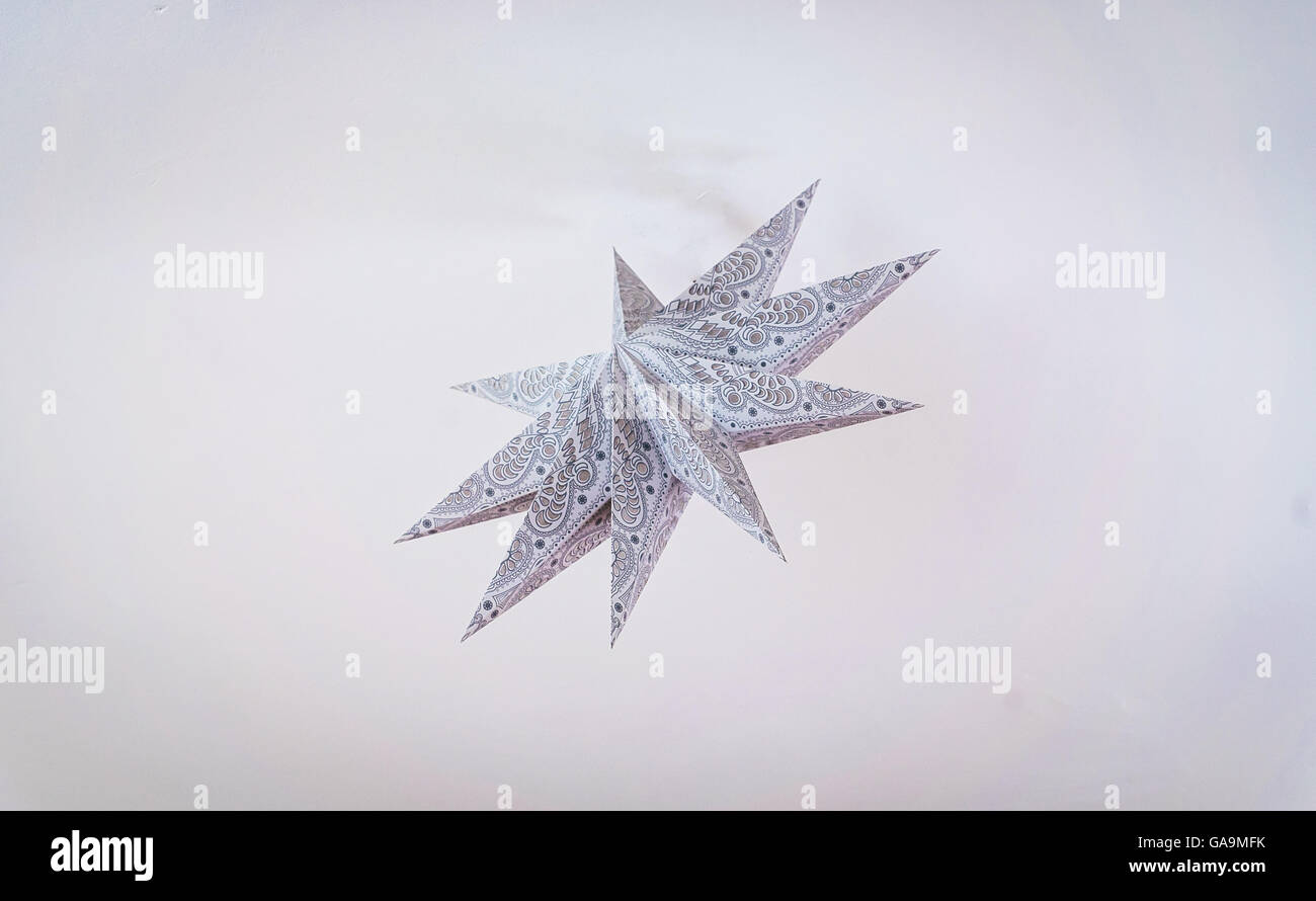 Decorative star made of paper Stock Photo - Alamy