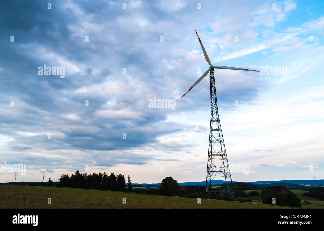 Turning wind engines in front of a dramatic sky Stock Photo - Alamy