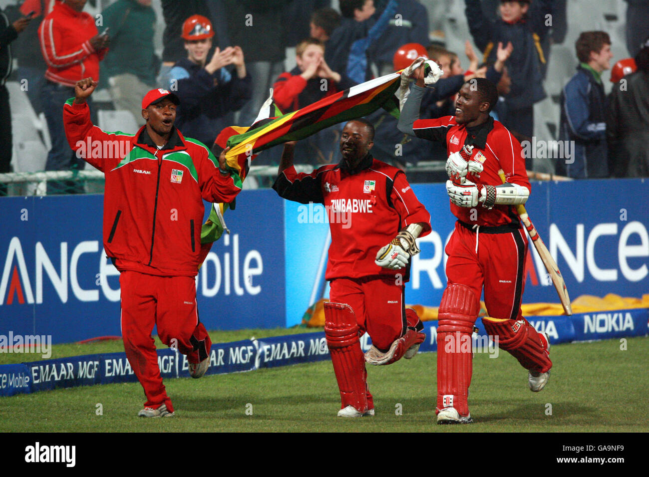 Zimbabwe (captain Prosper Utseya in middle) celebrate their remarkable ...