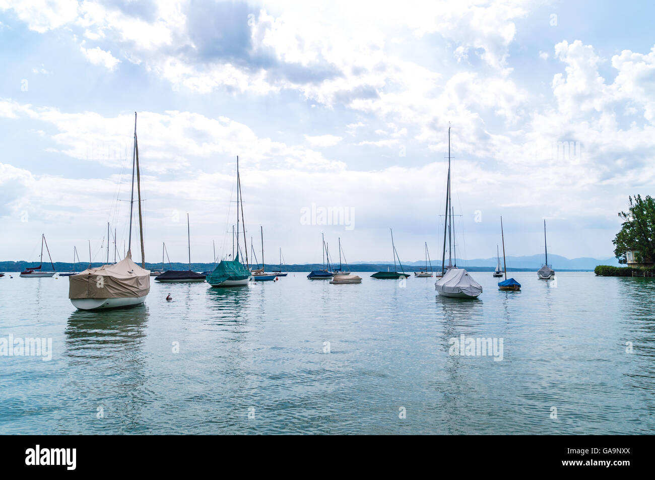 calm boats on lake Starnberger See Germany Stock Photo - Alamy