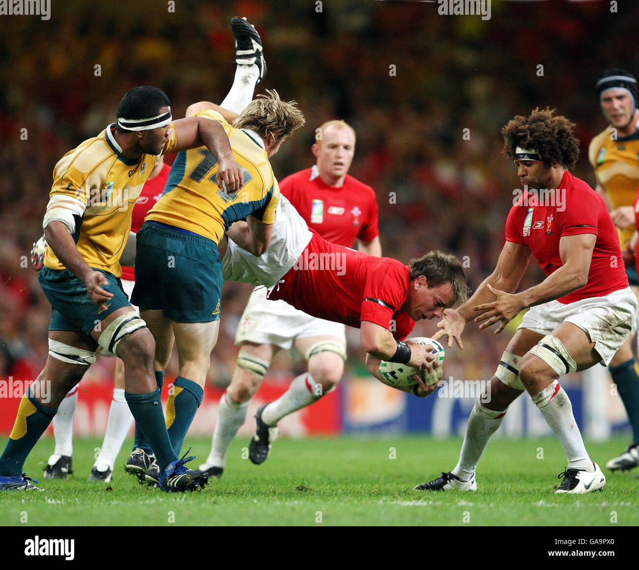 Wales matthew rees is upended by australias drew mitchell hi-res stock ...