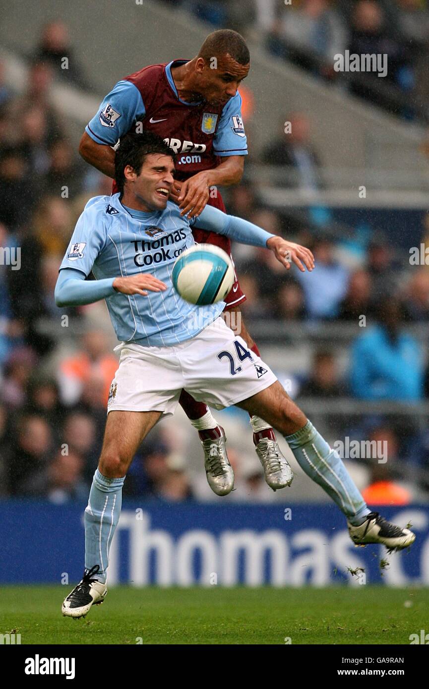 Manchester City's Javier Garrido and Aston Villa's Gabriel Agbonlahor ...