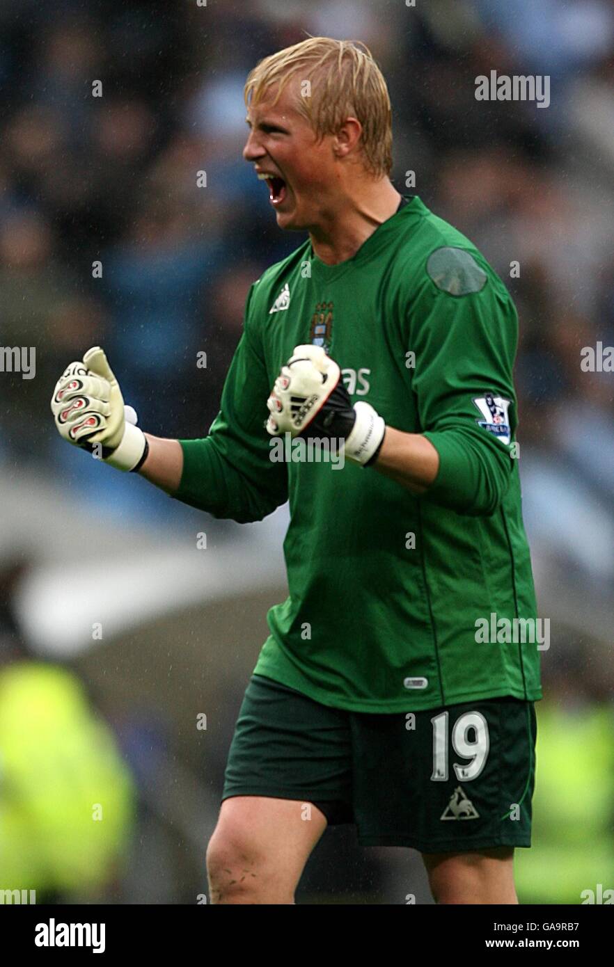 Manchester City goalkeeper Kasper Schmeichel celebrates victory over ...