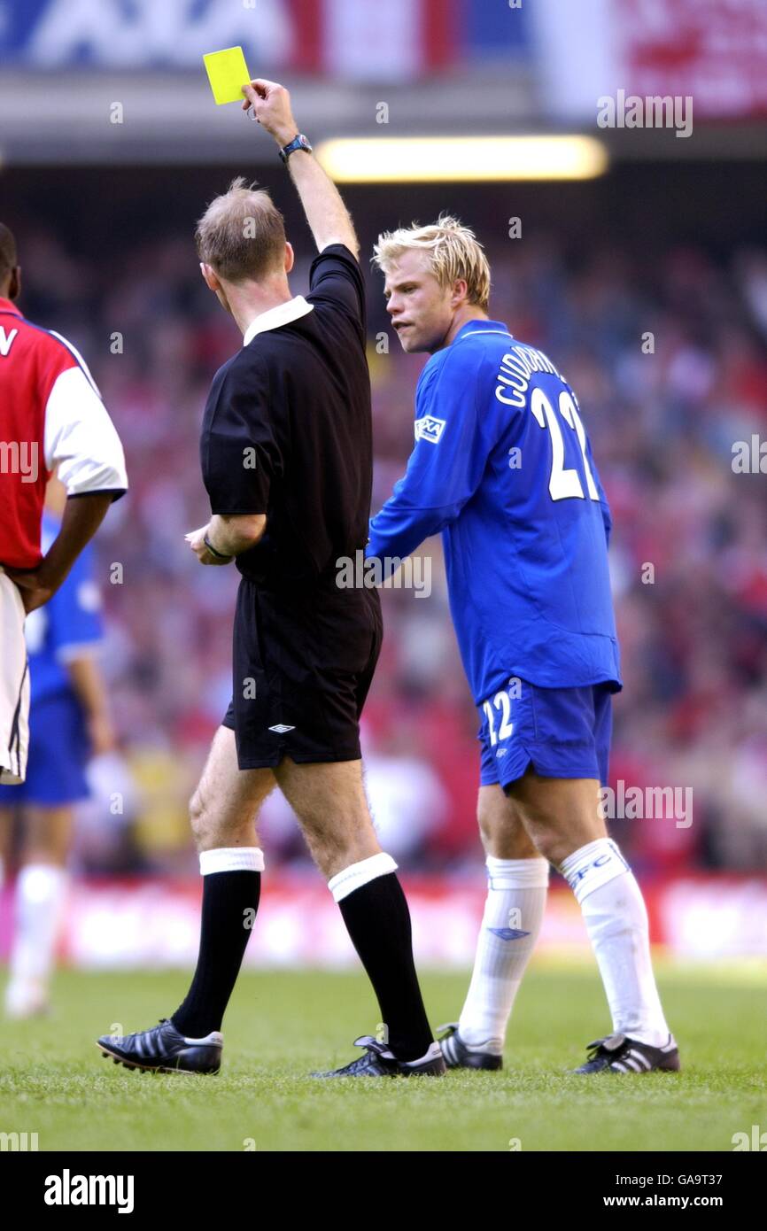 Referee mike riley shows chelseas eidur gudjohnsen the yellow card hi ...