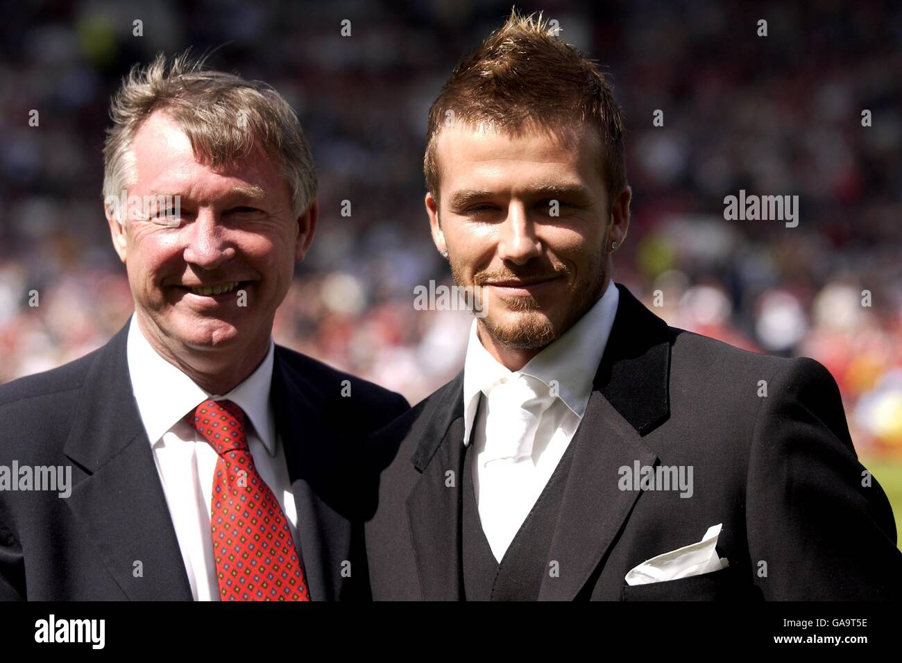 Manchester United's David Beckham with manager Sir Alex Ferguson after ...