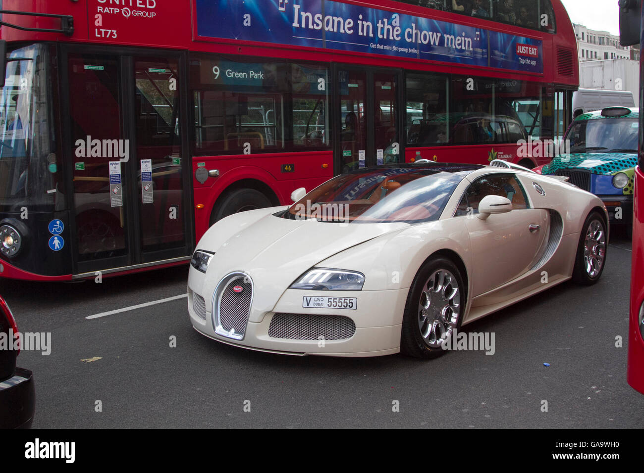 London,UK. 3rd August 2016. A beige Bugatti sports car with Dubai ...
