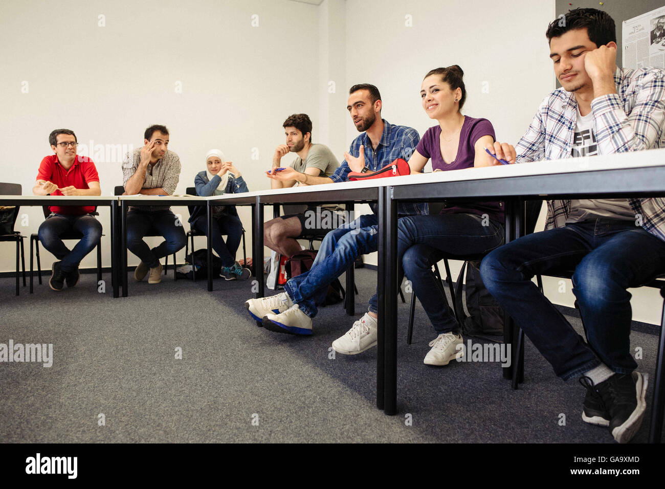 Refugees Mahmoud Mousavi (l-r), Maher Hayati, Raghad Koko, Saeed Moradi ...