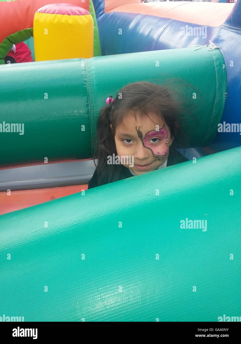 She was having fun playing hide and seek Stock Photo - Alamy