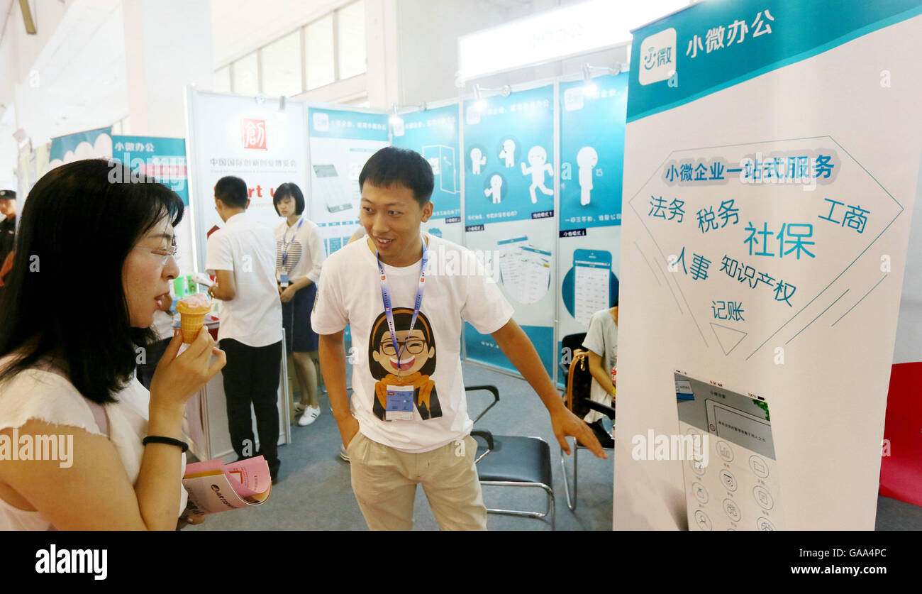 Beijing, China. 5th Aug, 2016. An exhibitor introduces internet office ...