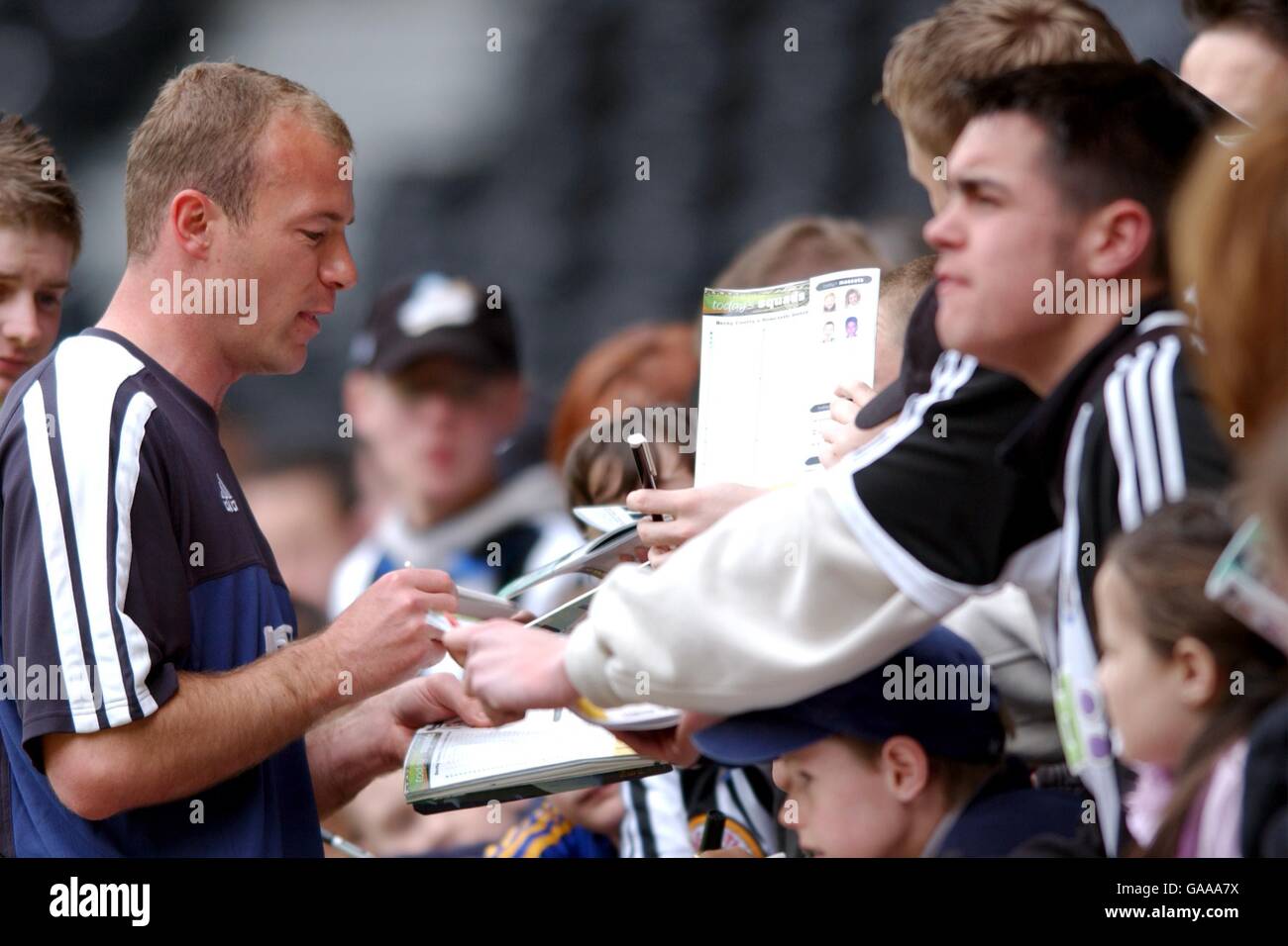 Newcastle United's Alan Shearer signs autographs for fans Stock Photo ...