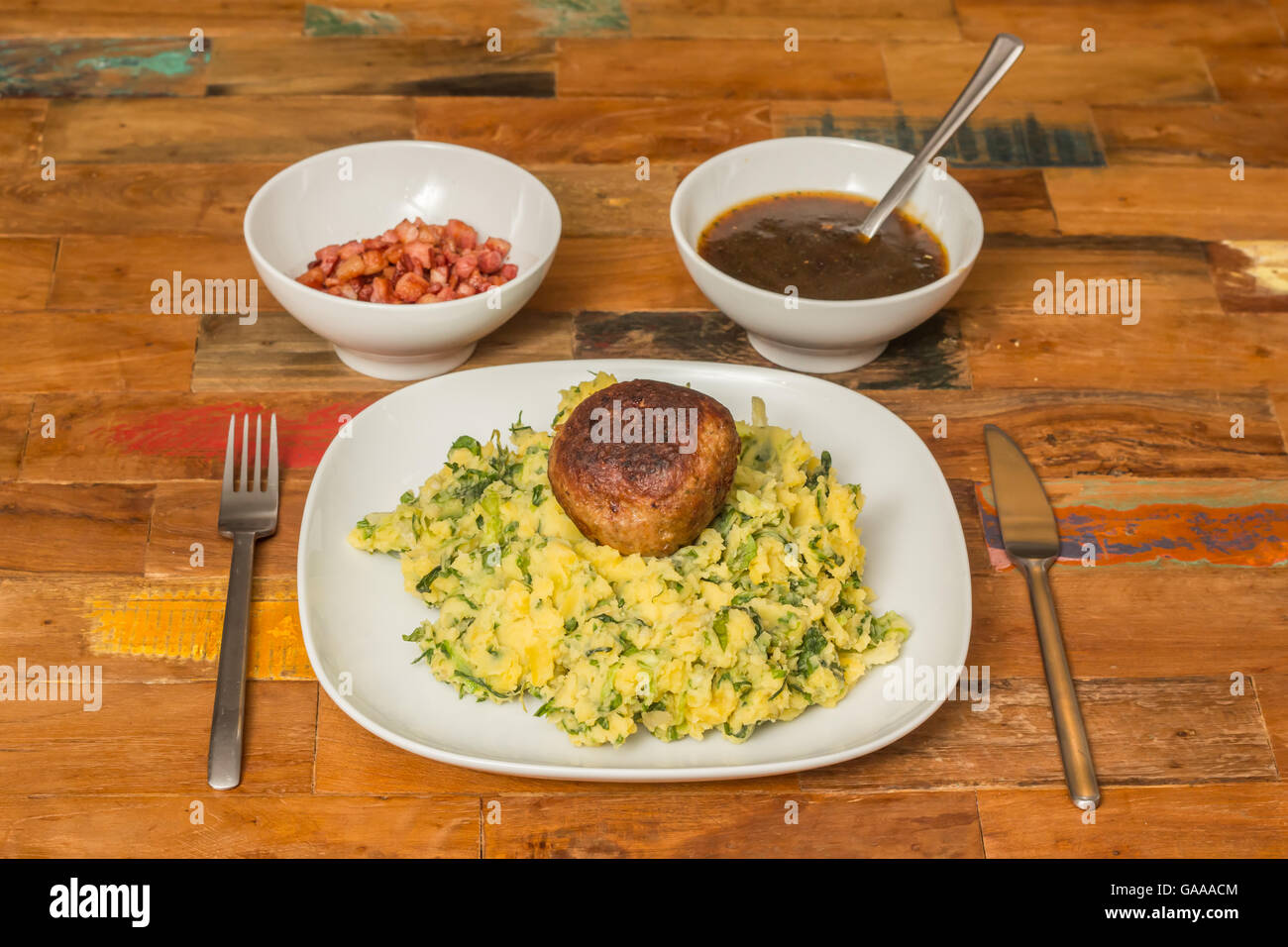Traditional dutch dish stamppot with endive, mashed potatoes, meatballs ...