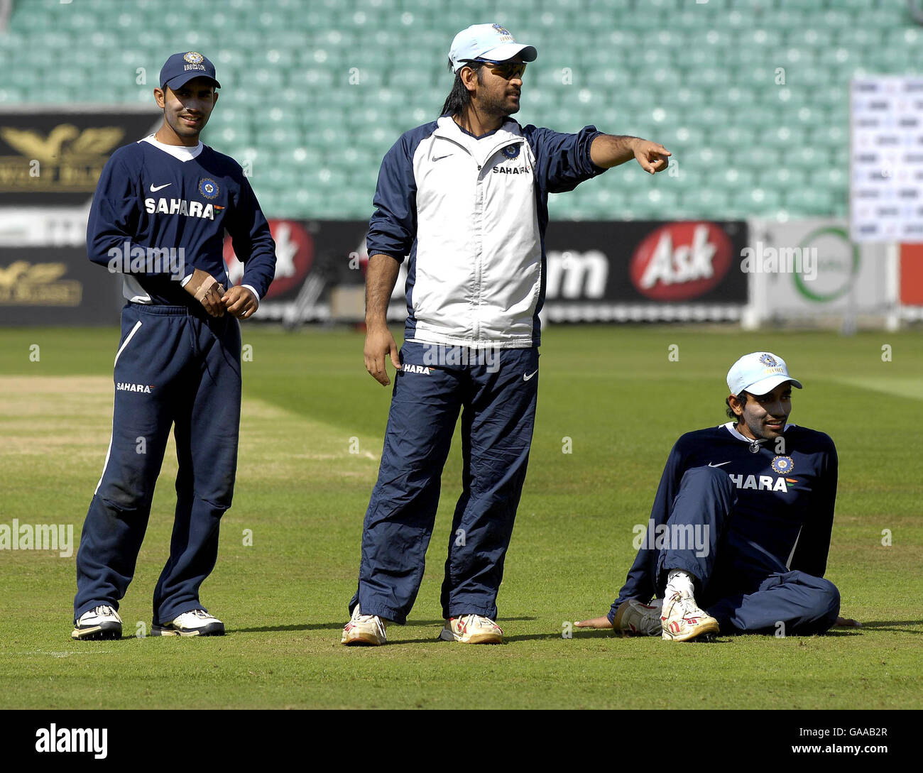 India's Mahendra Singh Dhoni (centre) during a training session at The ...