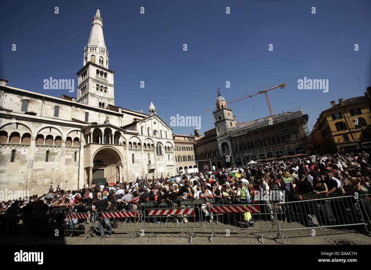 Crowds gather outside the 12th century cathedral Duomo Di Modena in ...