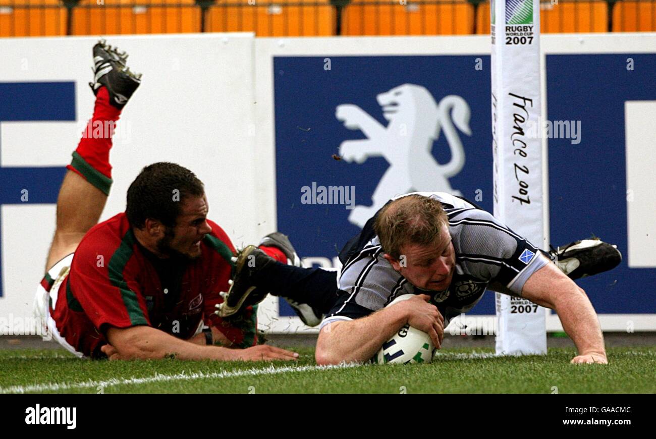 Scotland's Scott Lawson (right) scores his sides third try of the game ...