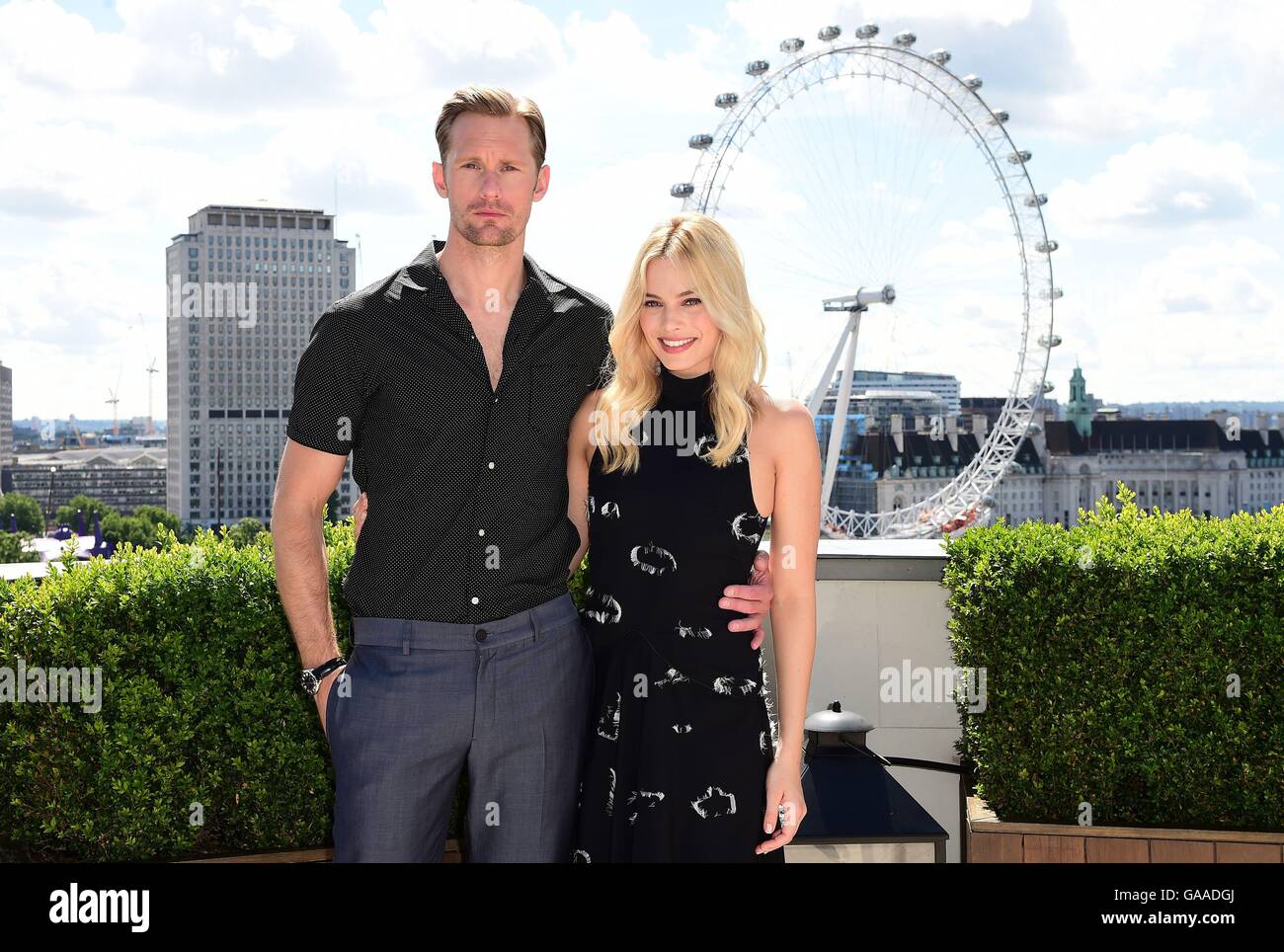 Alexander Skarsgard and Margot Robbie during the photocall promoting ...