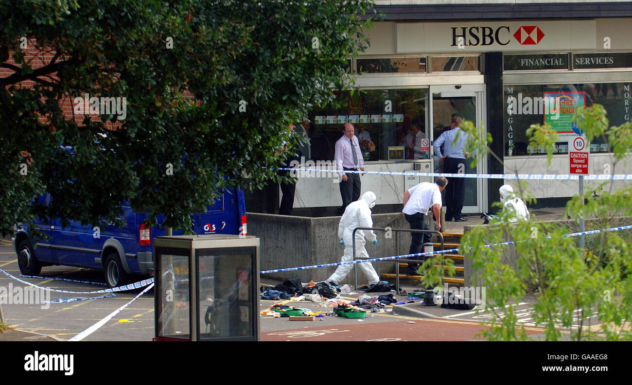 Robber shot dead during bank raid Stock Photo - Alamy