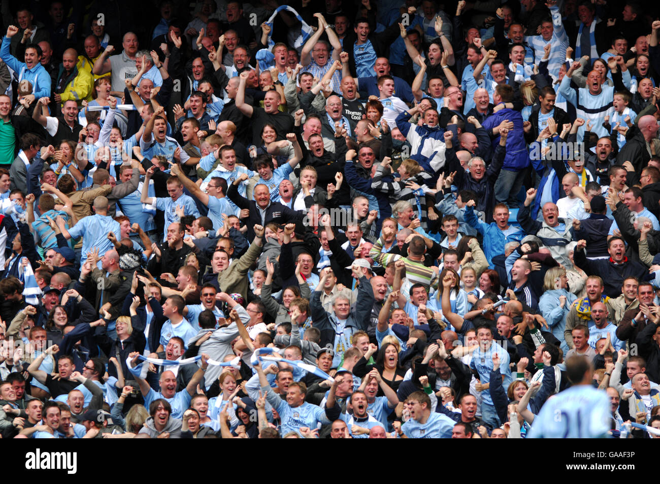 Manchester City fans celebrates in the stands after taking the lead in ...