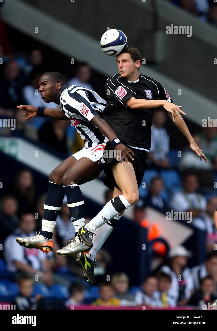 West Bromwich Albion's Ishmael Miller and Ipswich Town's Alex Bruce ...