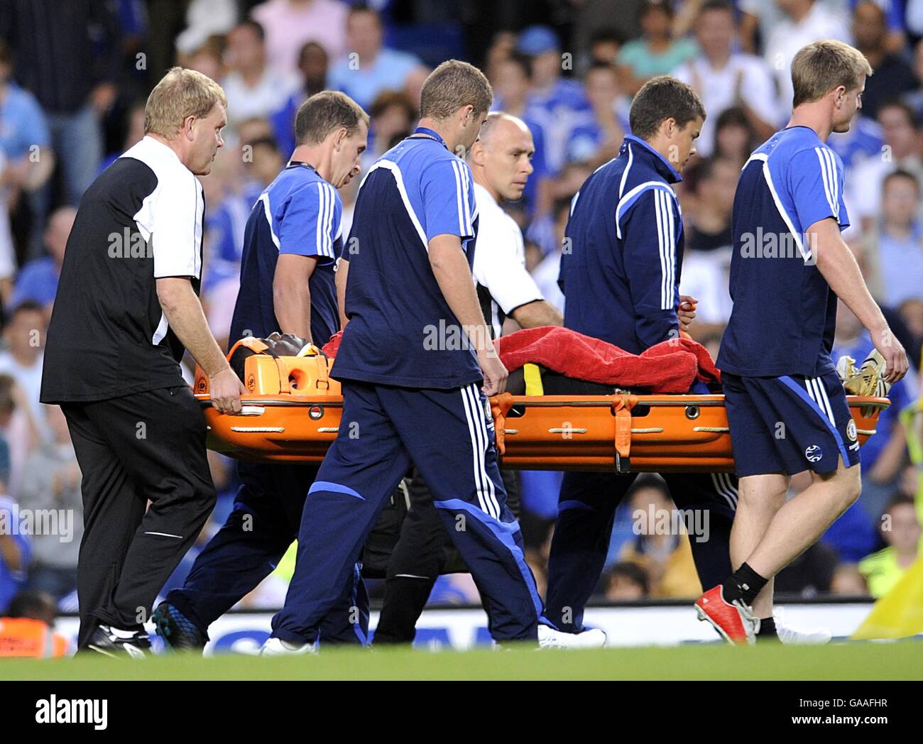 Full length serious injury stretcher football hi-res stock photography ...