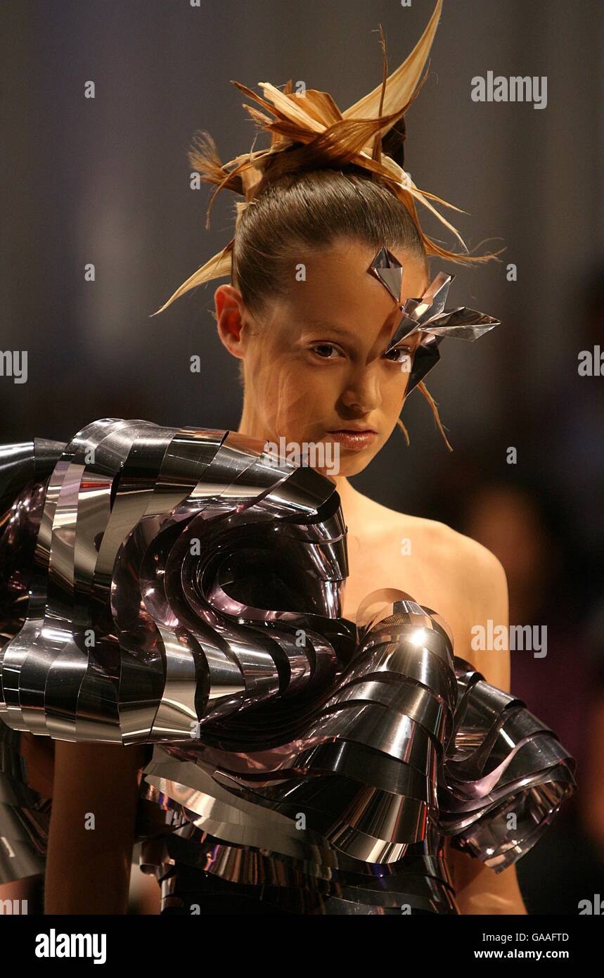 A model wears a creation by designer Ashley Isham at the Linbury ...