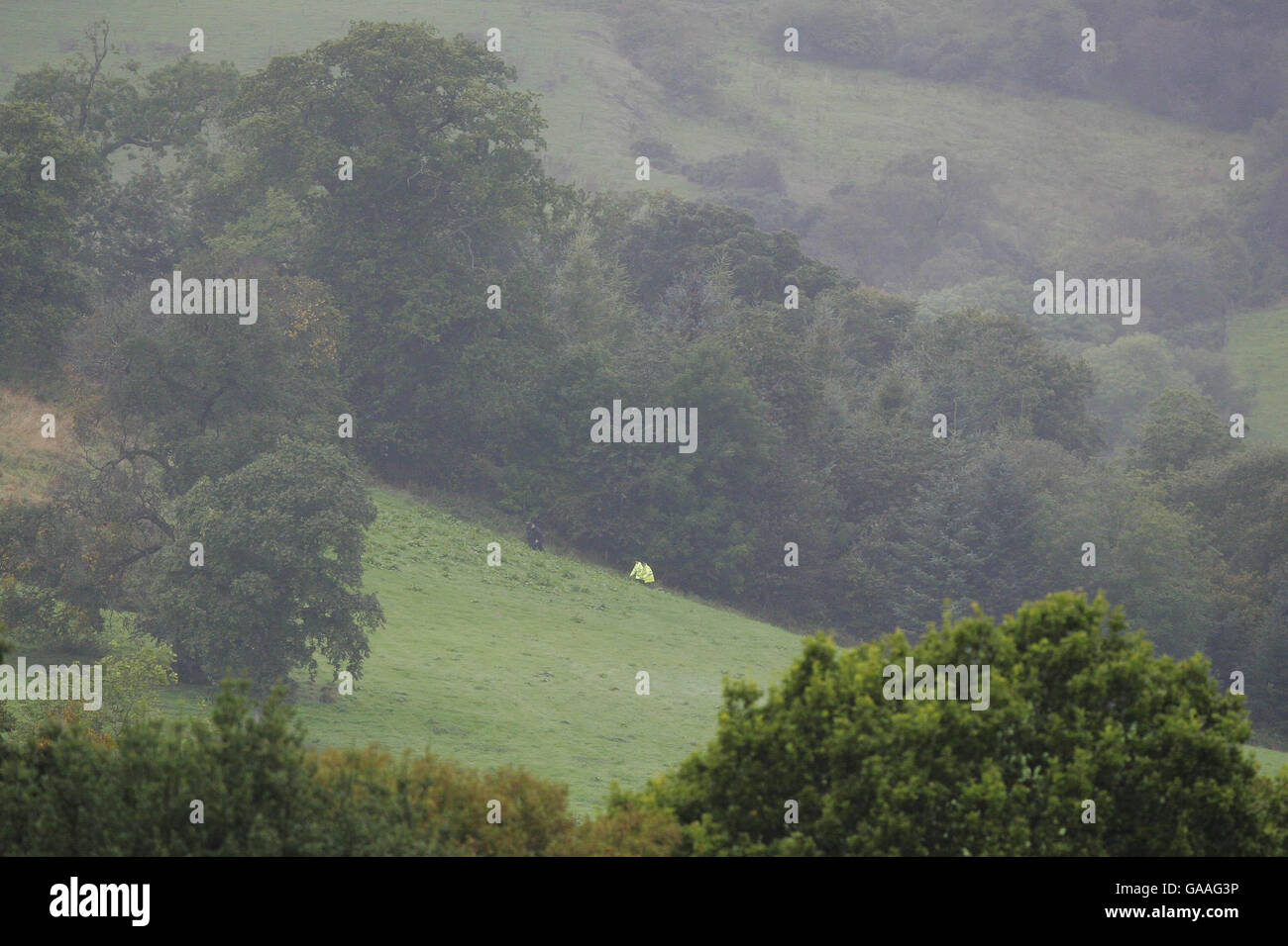 Police patrol the grounds of rally driver Colin McRae's estate at ...