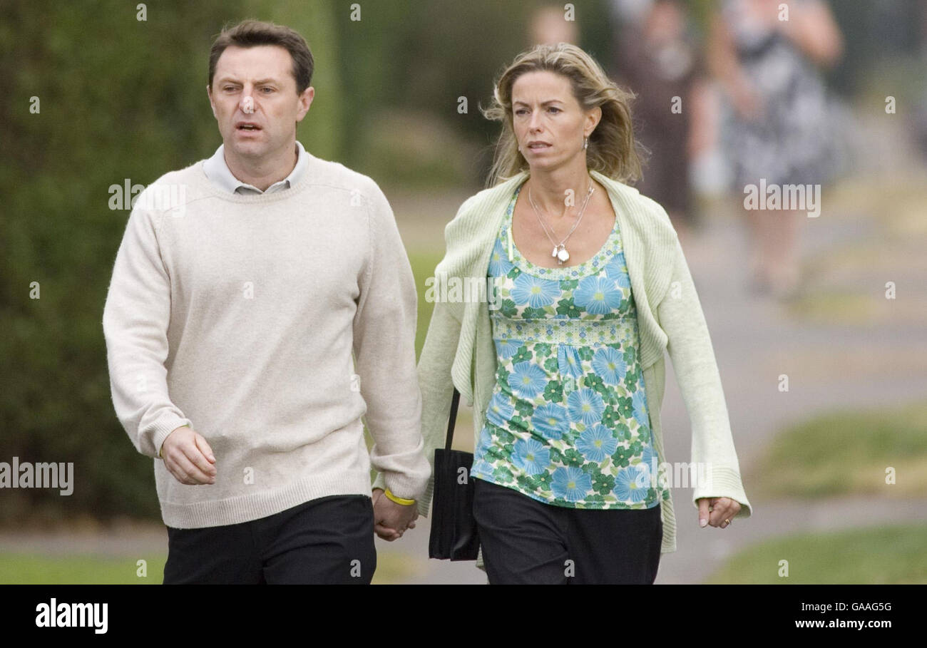 Kate and Gerry McCann, parents of missing toddler Madeleine, walk to ...