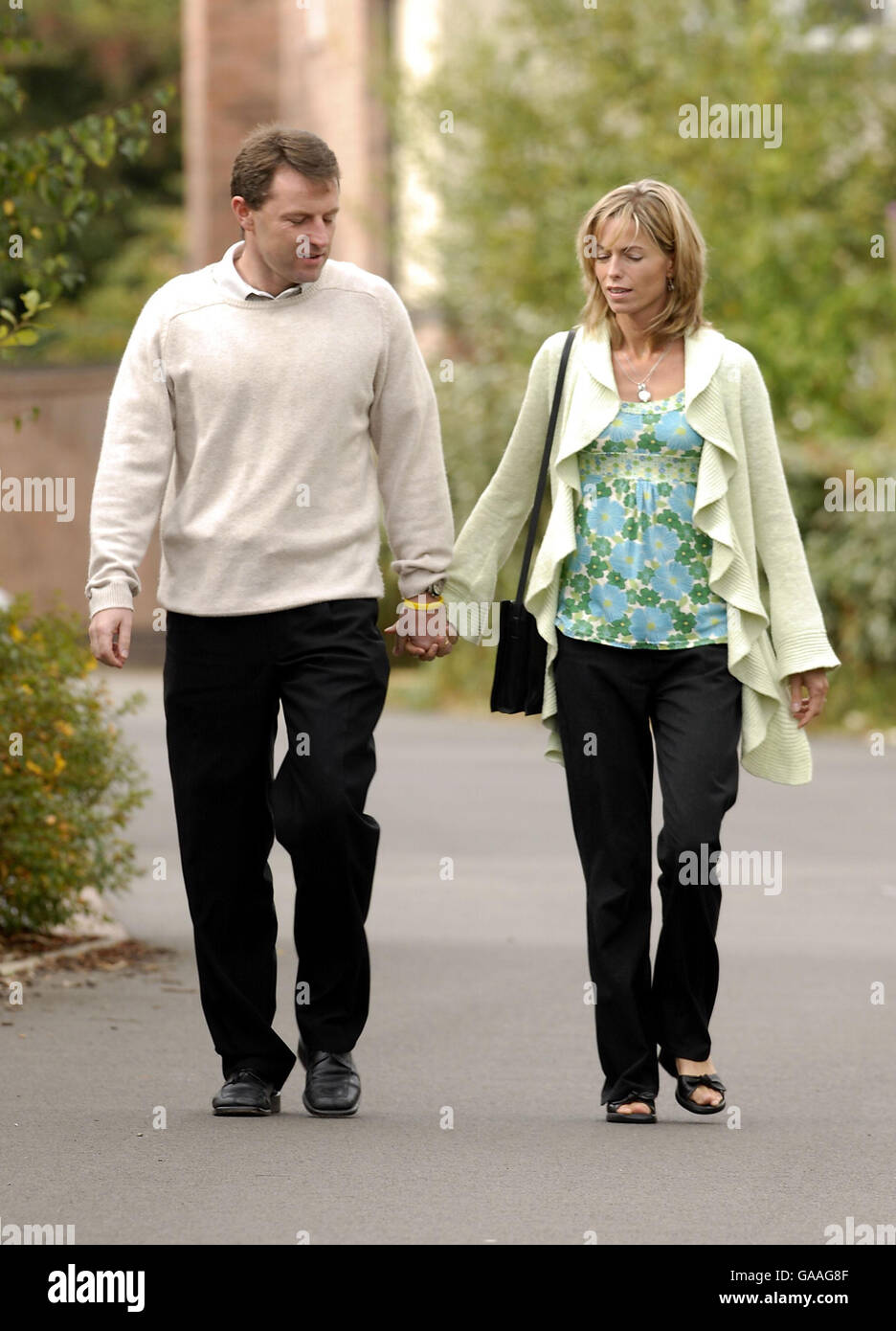 Kate and Gerry McCann, parents of missing toddler Madeleine, walk to ...