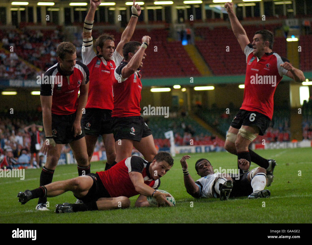 Canada's Mike Pyke goes over the line but the late try was dissallowed ...