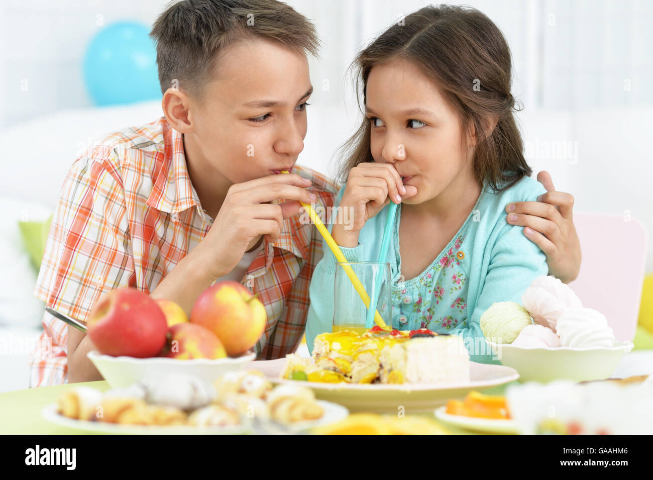 Happy children with cake Stock Photo - Alamy