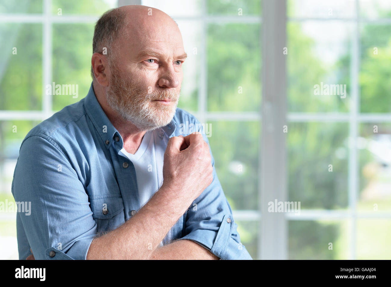 Senior man at home Stock Photo - Alamy