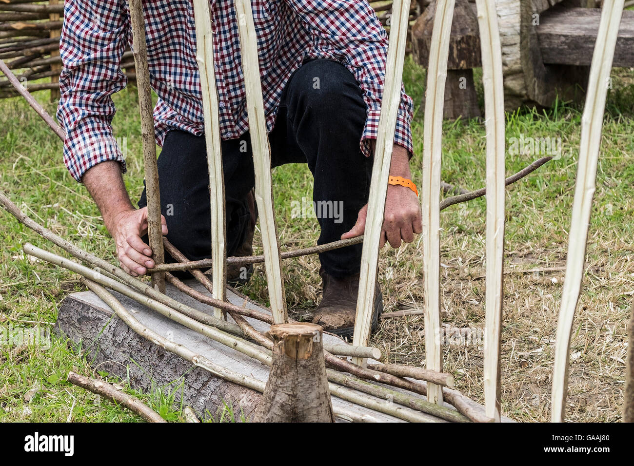 A traditional fence hurdle being made by a traditional craftsman Stock ...