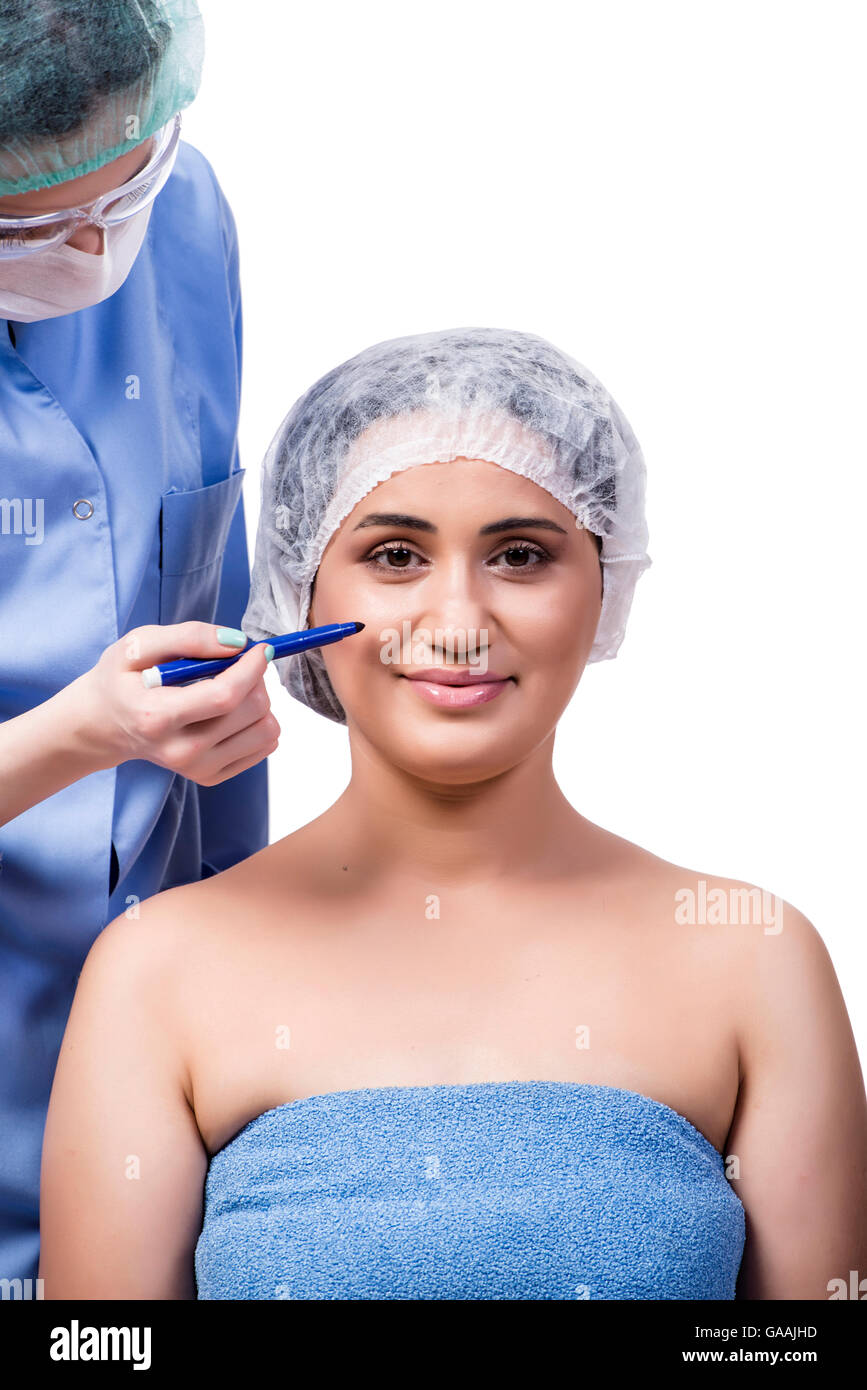 Young woman preparing for plastic surgery isolated on white Stock Photo ...