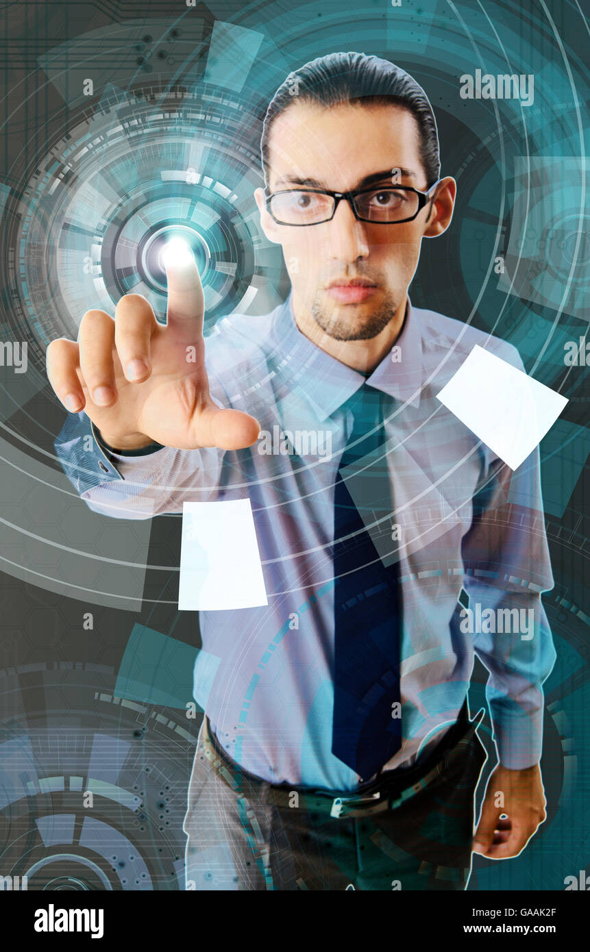 Businessman pressing virtual buttons in futuristic concept Stock Photo ...