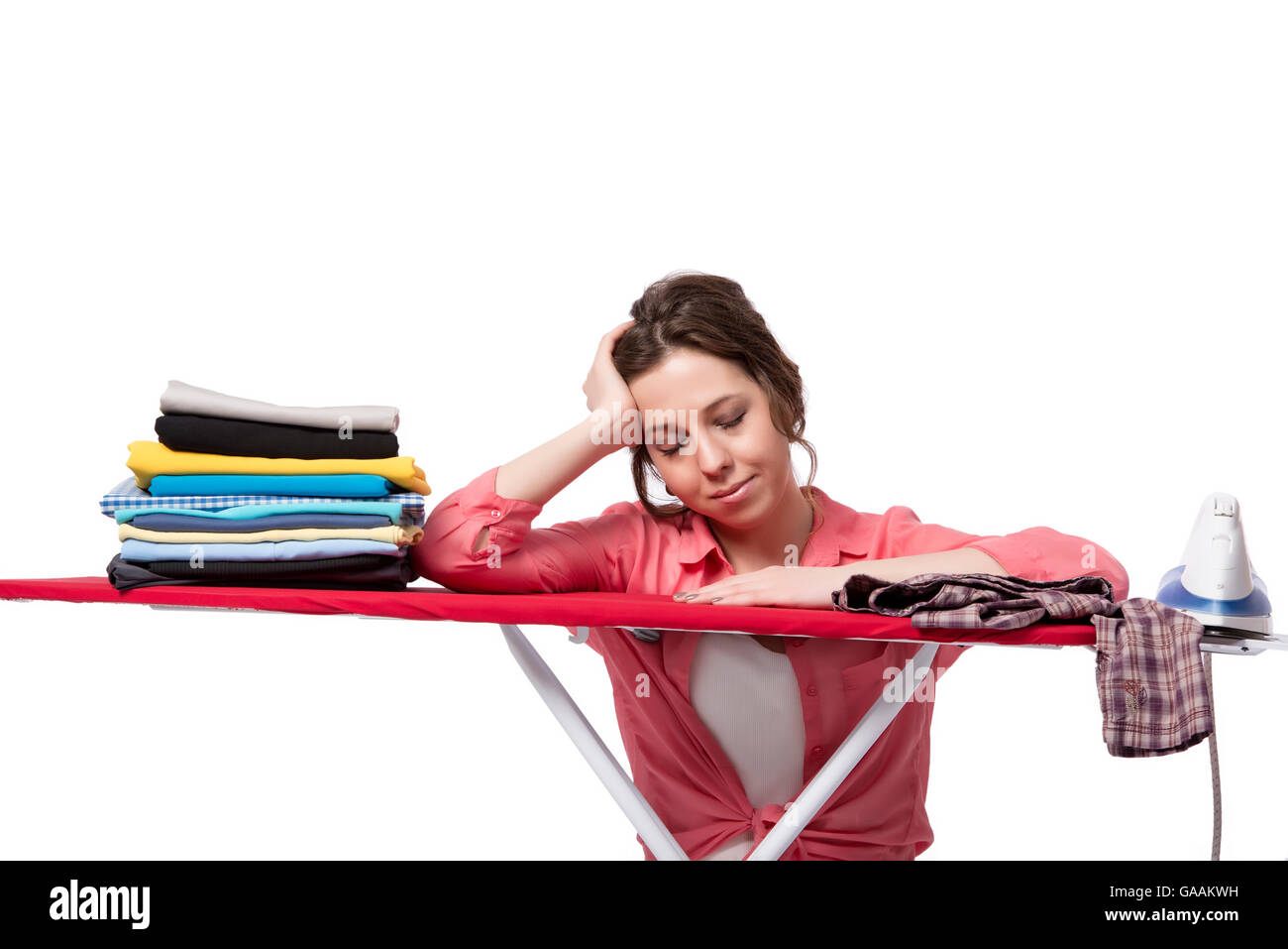 Young woman doing ironing isolated on white Stock Photo - Alamy