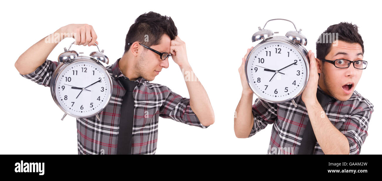 Young man with clock isolated on white Stock Photo - Alamy