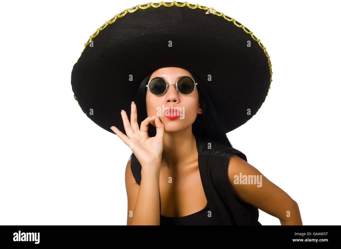 Young mexican woman wearing sombrero isolated on white Stock Photo - Alamy