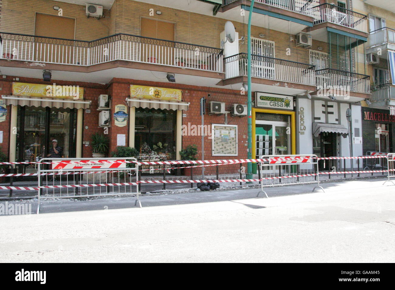 Fallen rubble from a building cornices in Arzano. Falling rubble from a ...