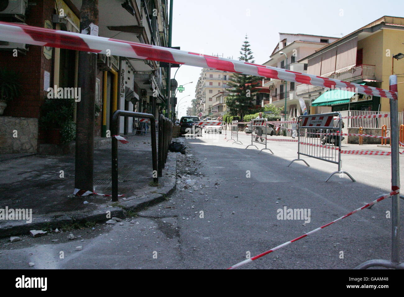Fallen rubble from a building cornices in Arzano. Falling rubble from a ...