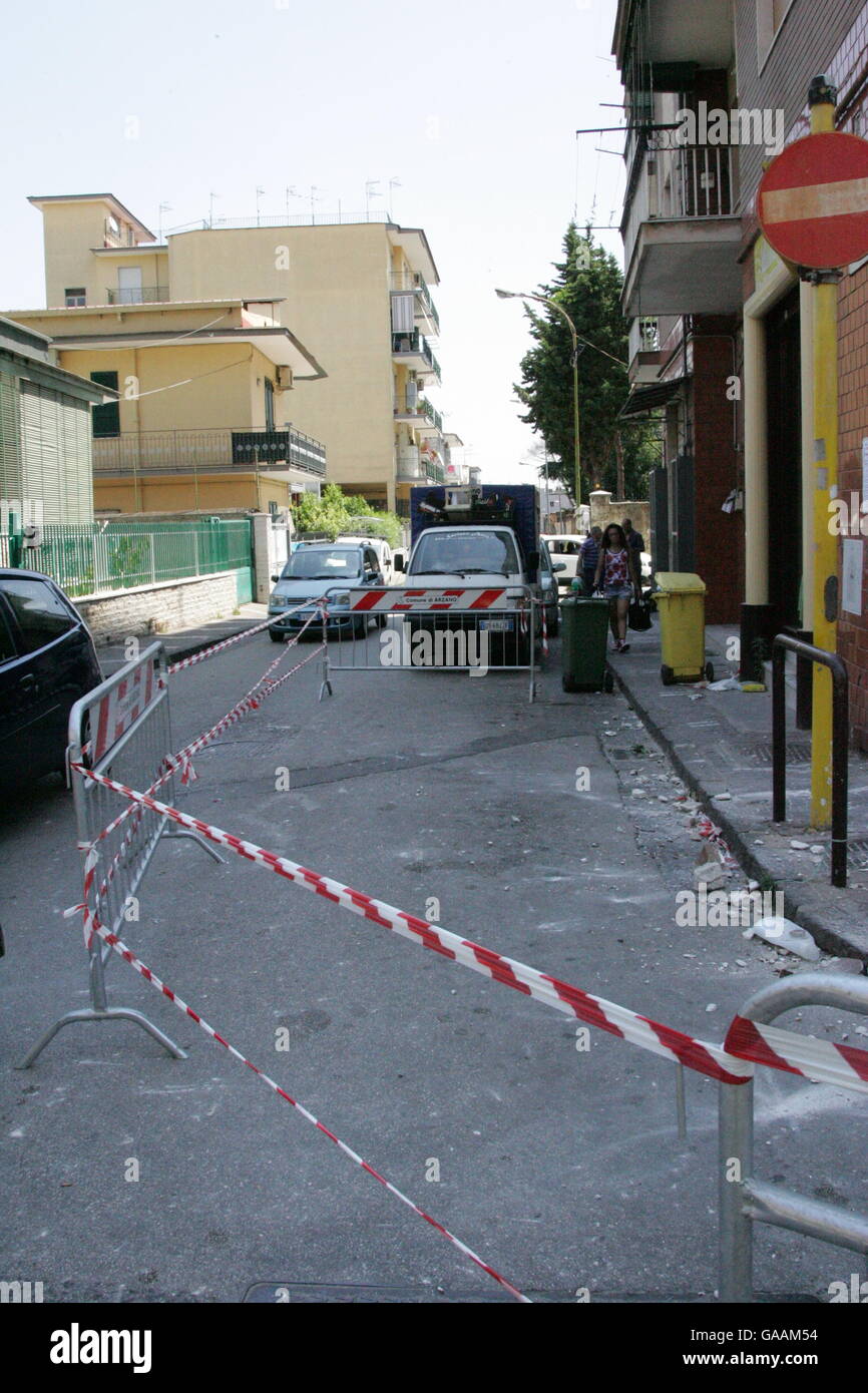 Fallen rubble from a building cornices in Arzano. Falling rubble from a ...