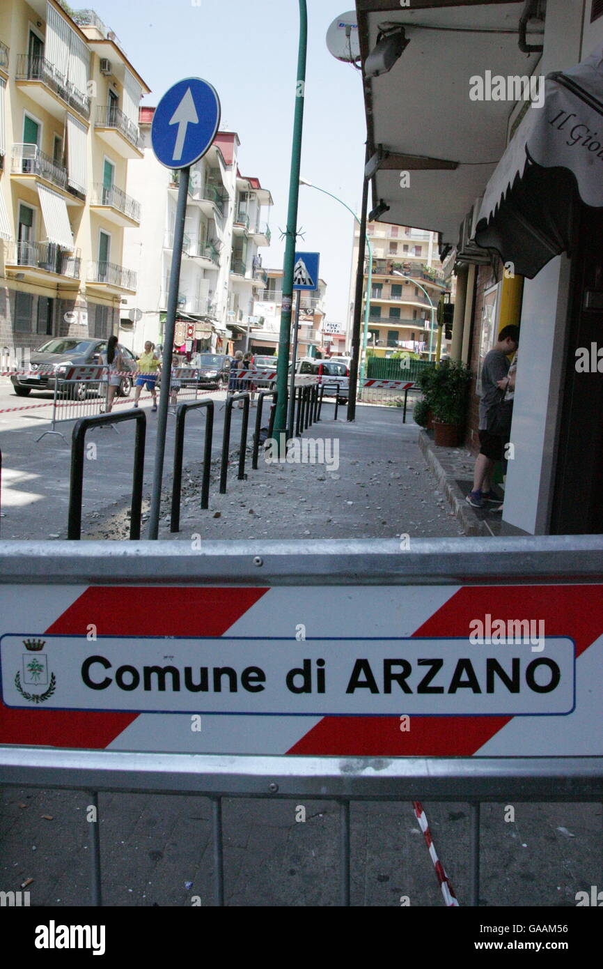 Fallen rubble from a building cornices in Arzano. Falling rubble from a ...