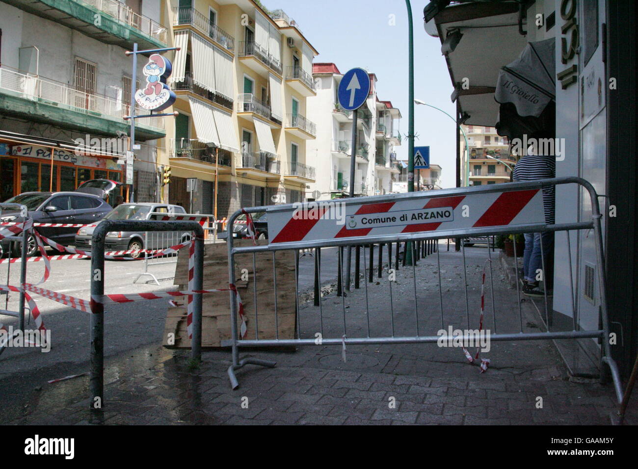 Fallen rubble from a building cornices in Arzano. Falling rubble from a ...