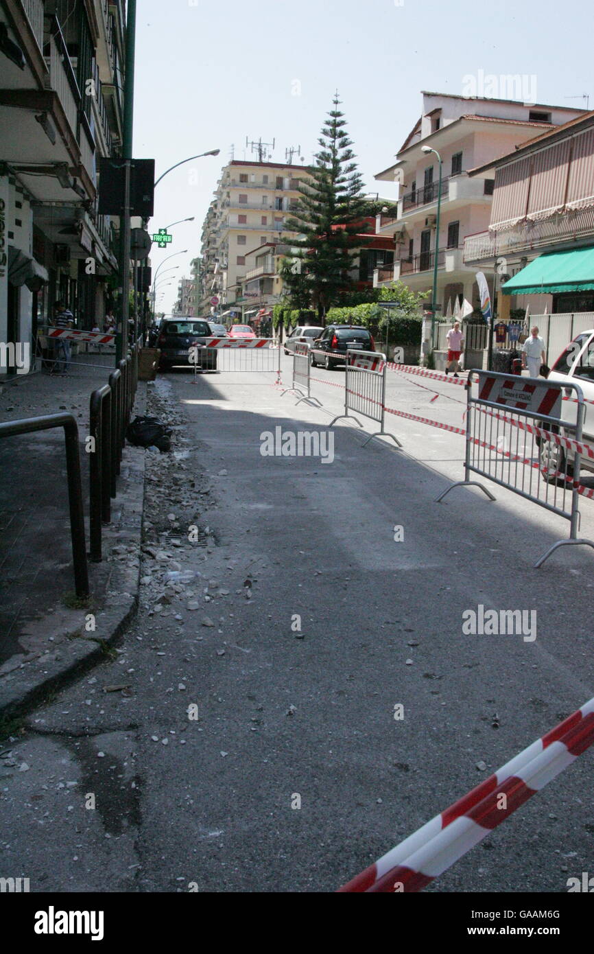 Fallen rubble from a building cornices in Arzano. Falling rubble from a ...
