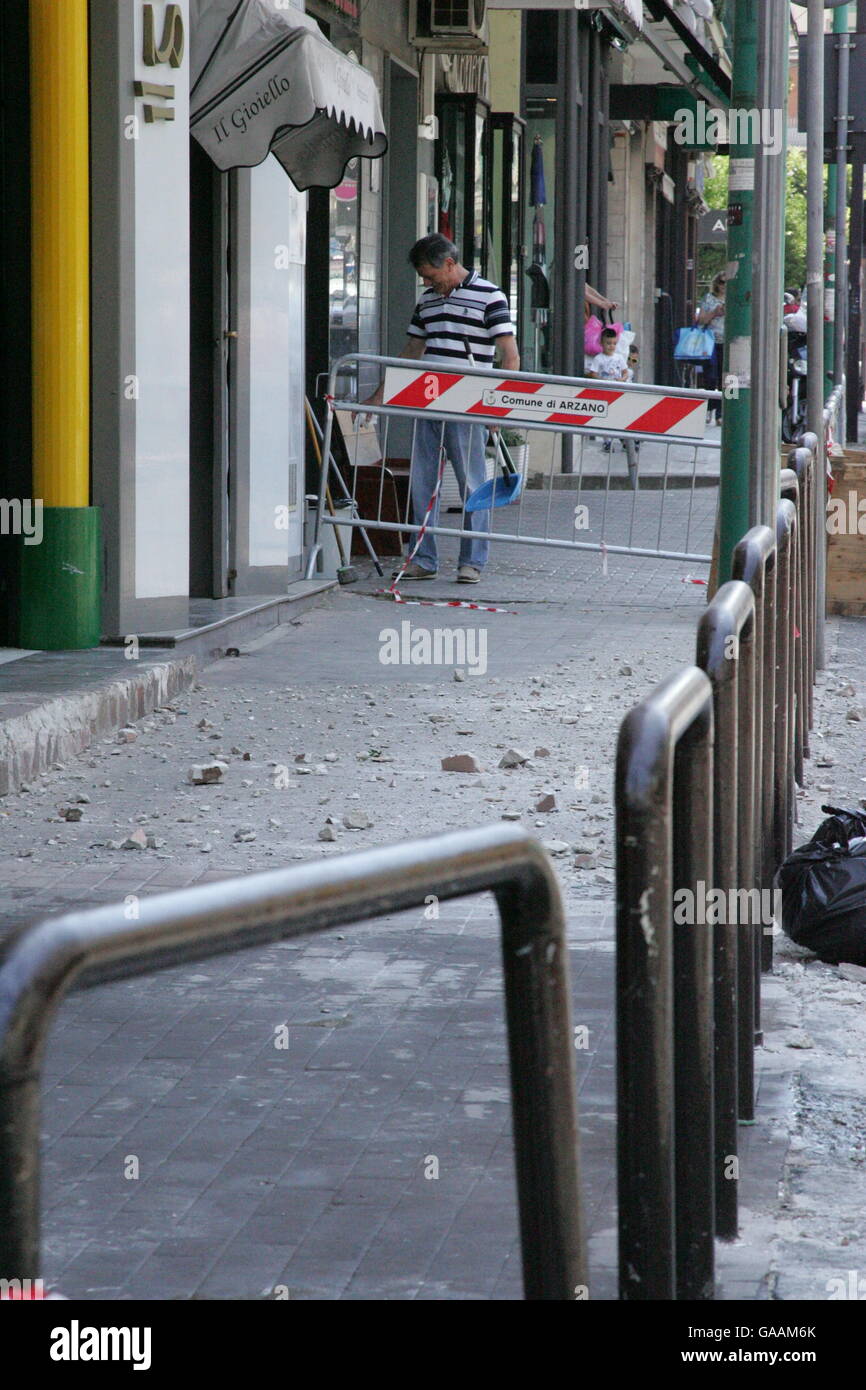 Fallen rubble from a building cornices in Arzano. Falling rubble from a ...