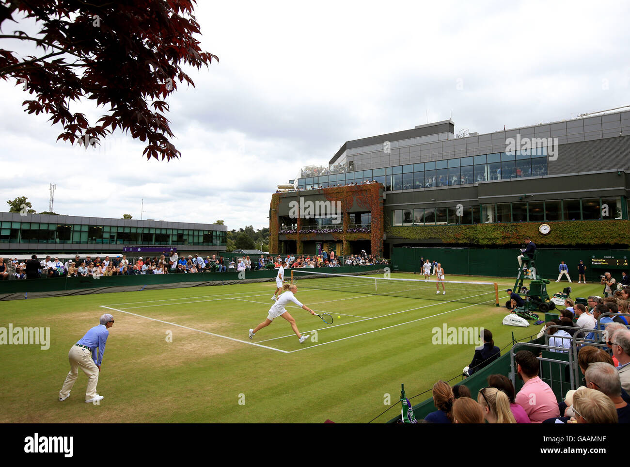 Colin Fleming and Jocelyn Ray receive serve on court 16 during their ...