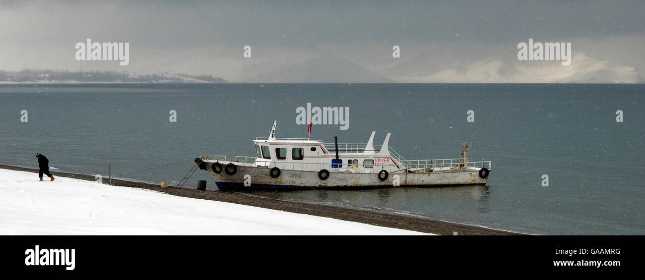 Fisher boat back to Van port. Van Lake has special fish, Alburnus ...