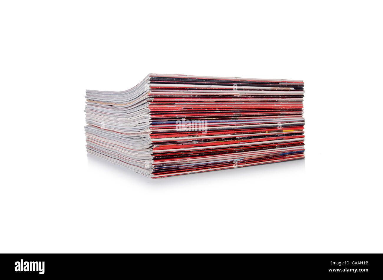Stack of magazine isolated on the white background Stock Photo - Alamy