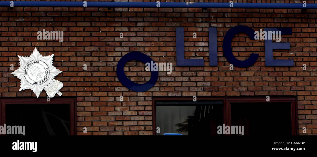 The Police Sign hangs off the wall outside Huntingdon Police Station ...