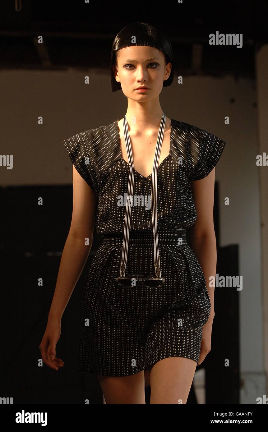 London Fashion Week - Rodnik Show. A model wears a creation by designer ...