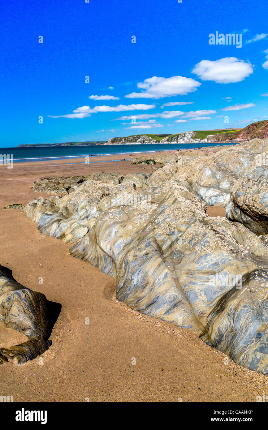 Sea smoothed rock strata on the beach at Bigbury on Sea, South Devon ...